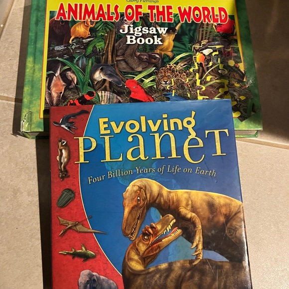 Toys | Evolving Planet Book Animal Puzzle Book | Poshmark
